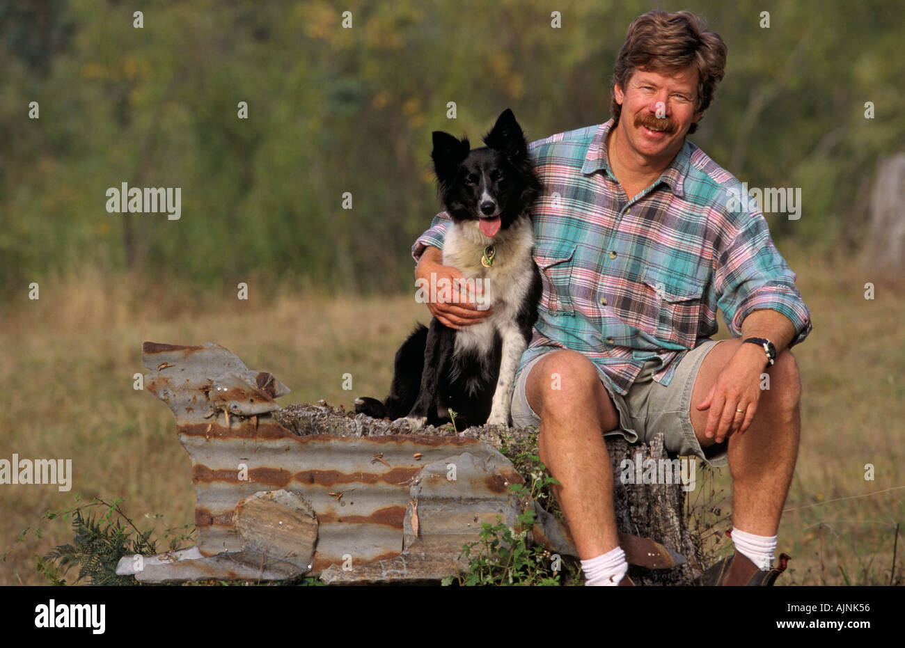 Man with border collie dog, Australia Stock Photo - Alamy