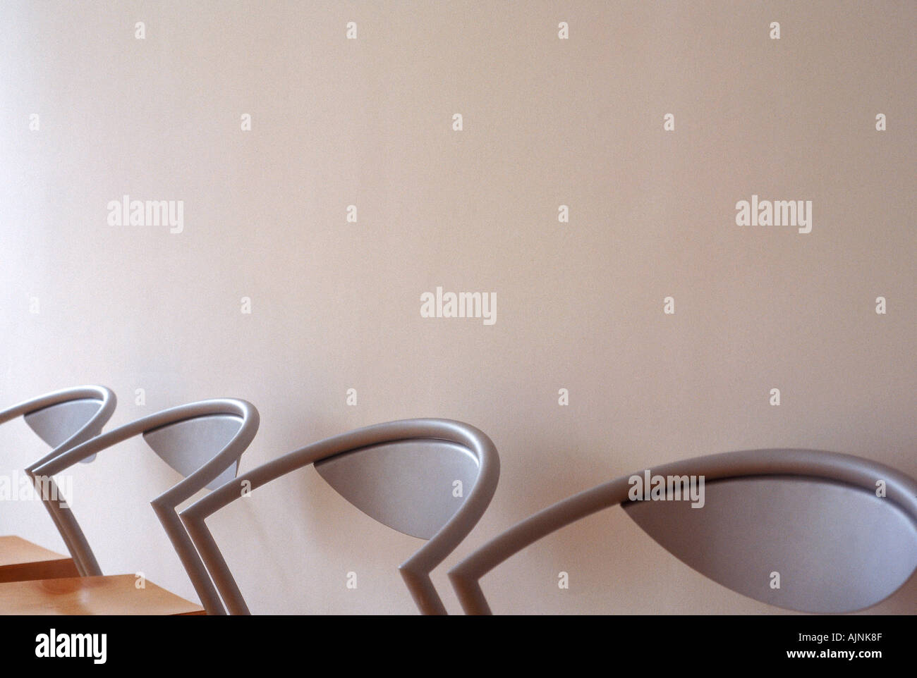 Chairs in line Stock Photo - Alamy