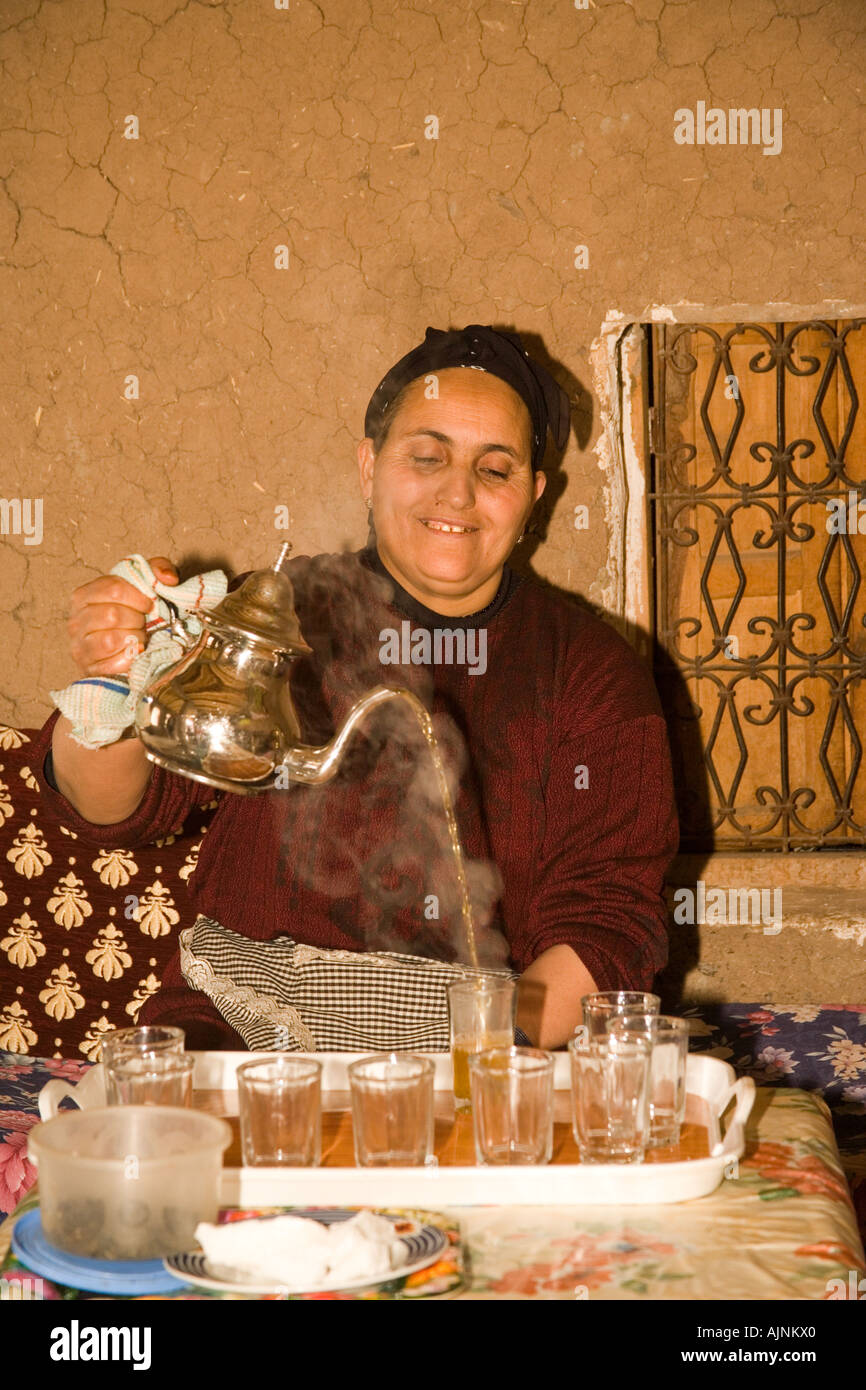 Berber Woman Pours a Welcoming Mint Tea in her Adobe Home, Ourika ...