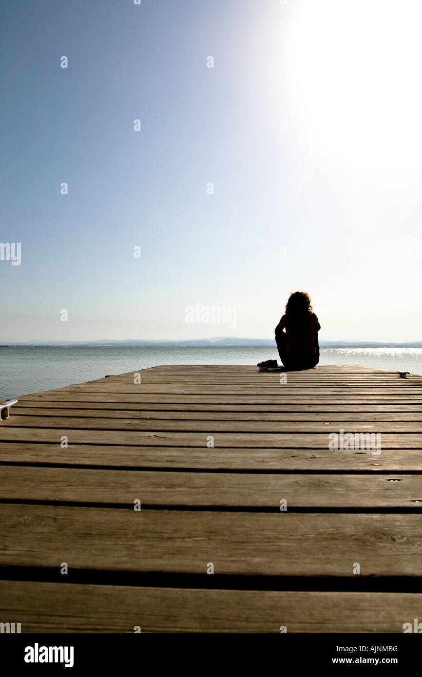 A girl looking far away Stock Photo - Alamy
