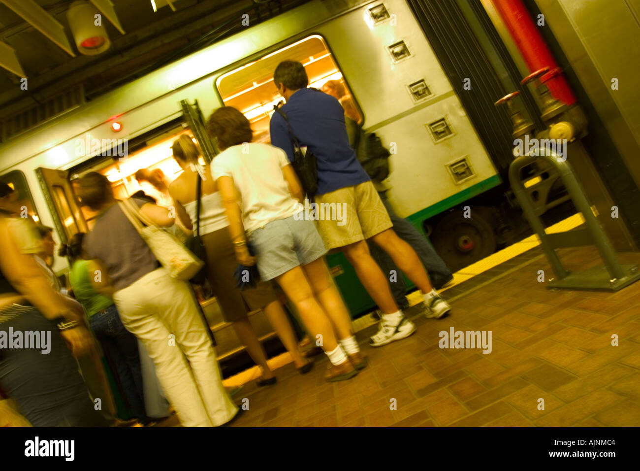 People entering a subway train Stock Photo - Alamy