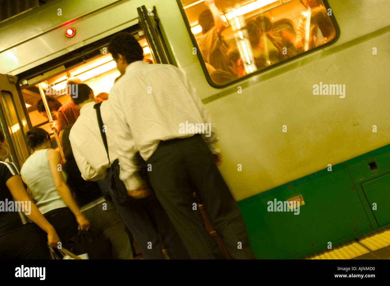 People entering a subway train Stock Photo - Alamy