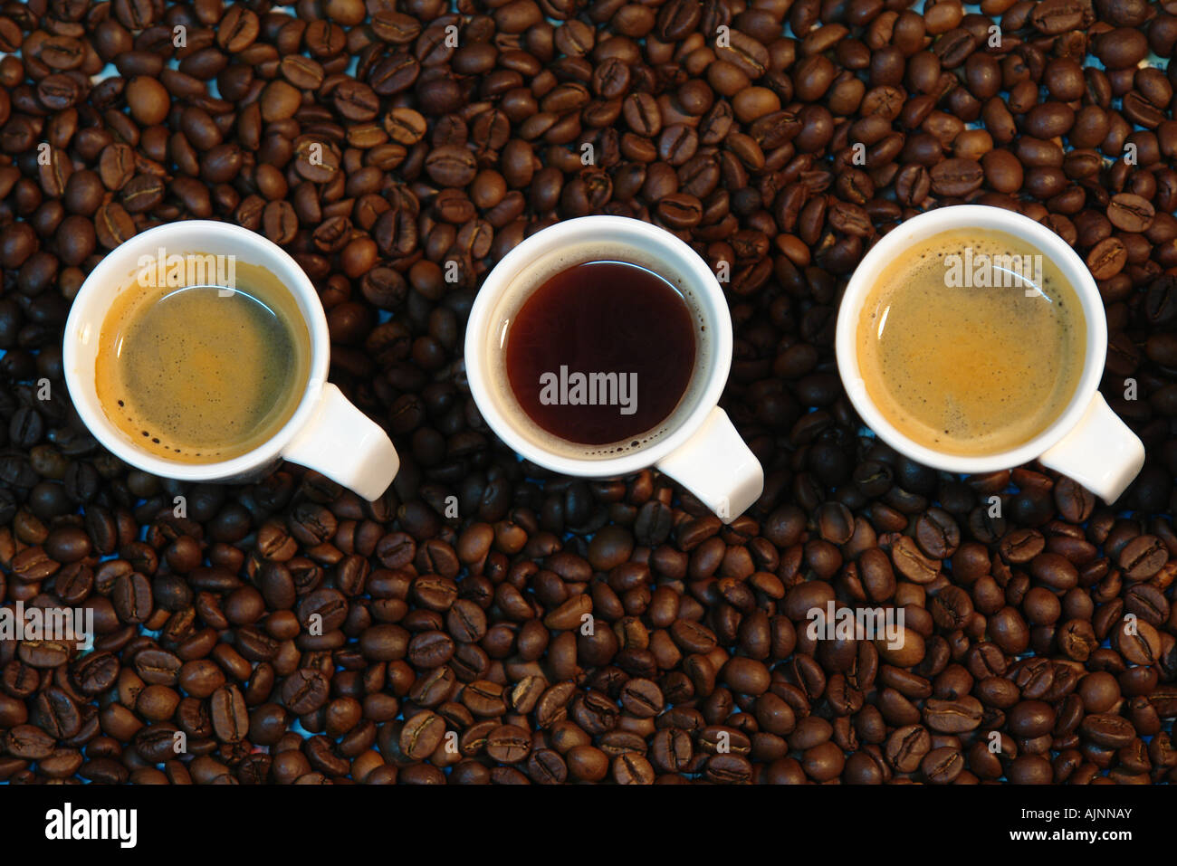 Three cups of coffee Stock Photo - Alamy