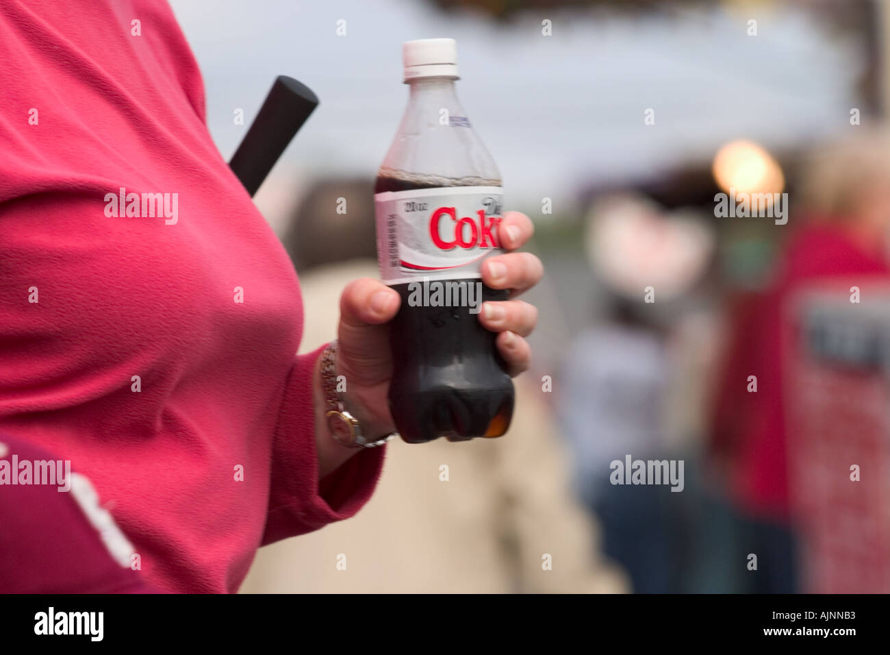 Woman and coke bottle hi-res stock photography and images - Alamy