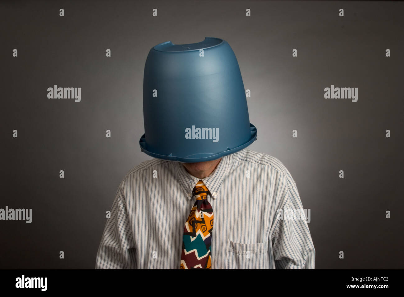 Man bucket covering head hi-res stock photography and images - Alamy