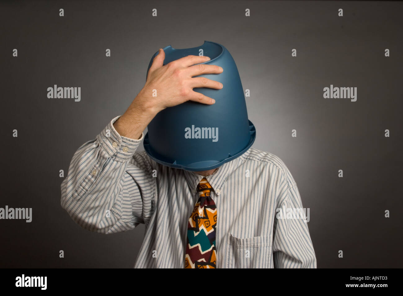 Man bucket covering head hi-res stock photography and images - Alamy