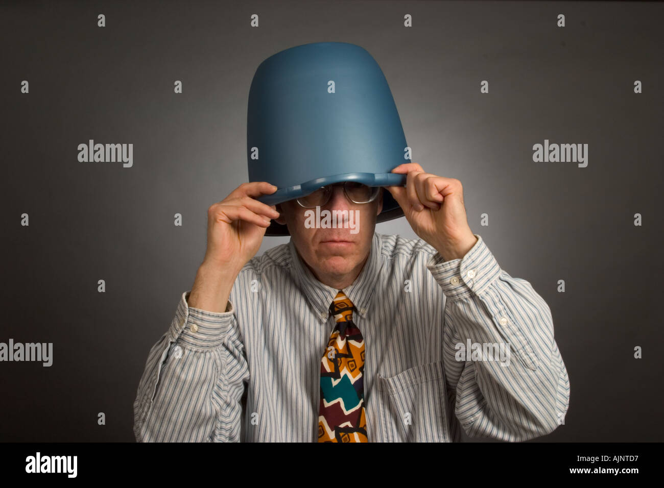 Man bucket covering head hi-res stock photography and images - Alamy