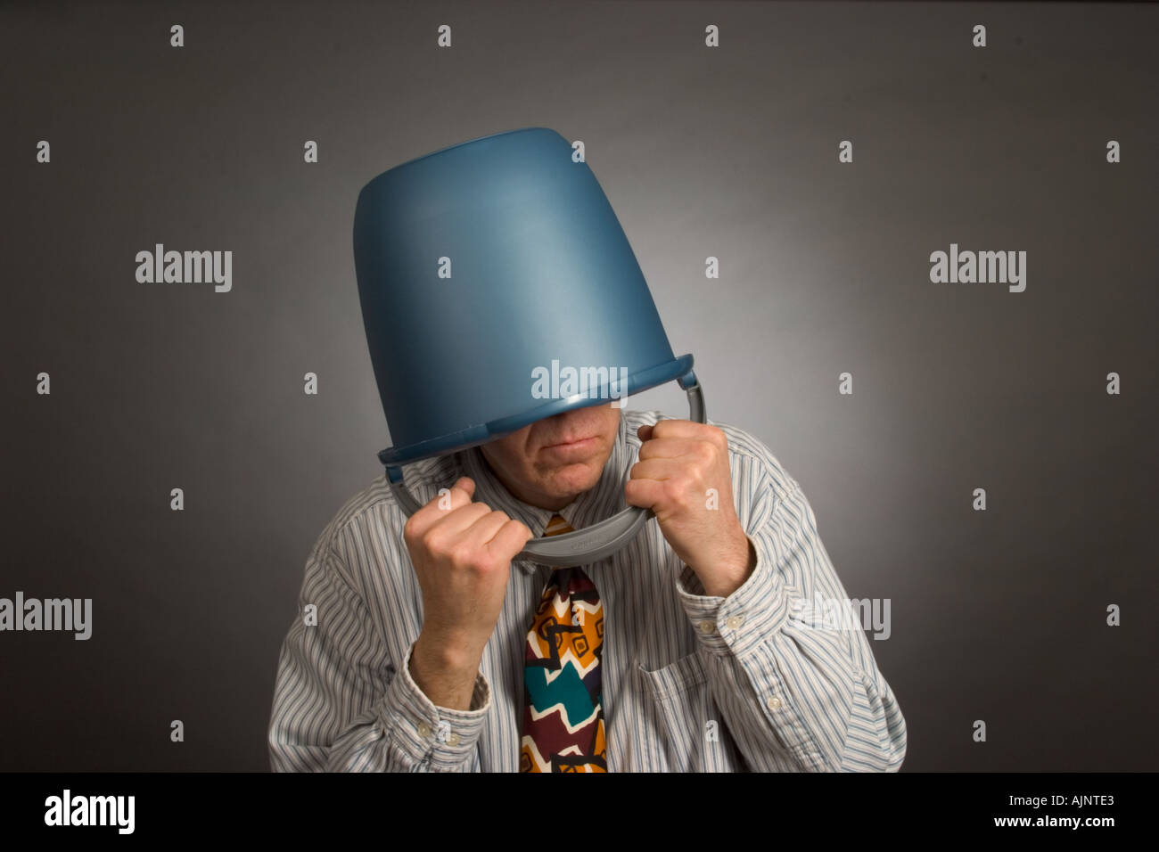 Man bucket covering head hi-res stock photography and images - Alamy