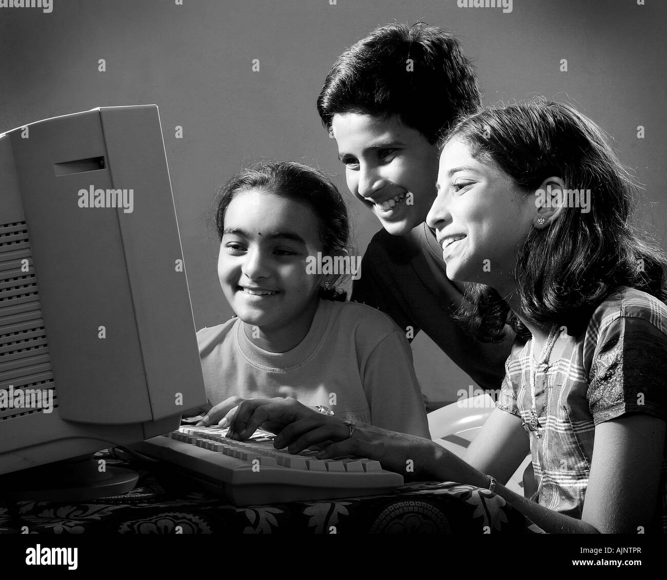 Children using a computer Stock Photo - Alamy