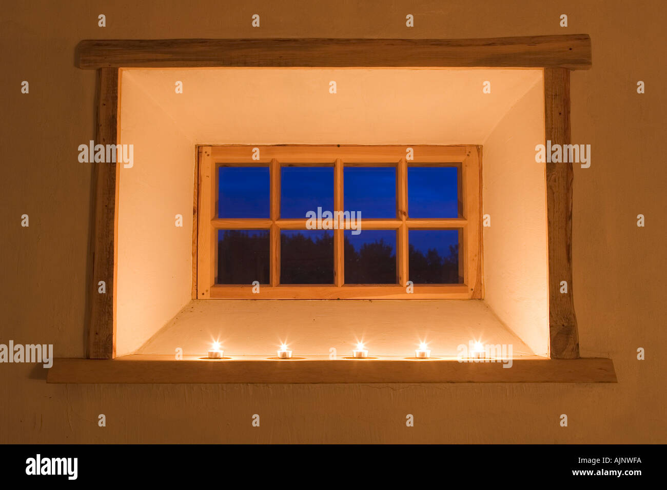Lights illuminating a window frame Stock Photo - Alamy