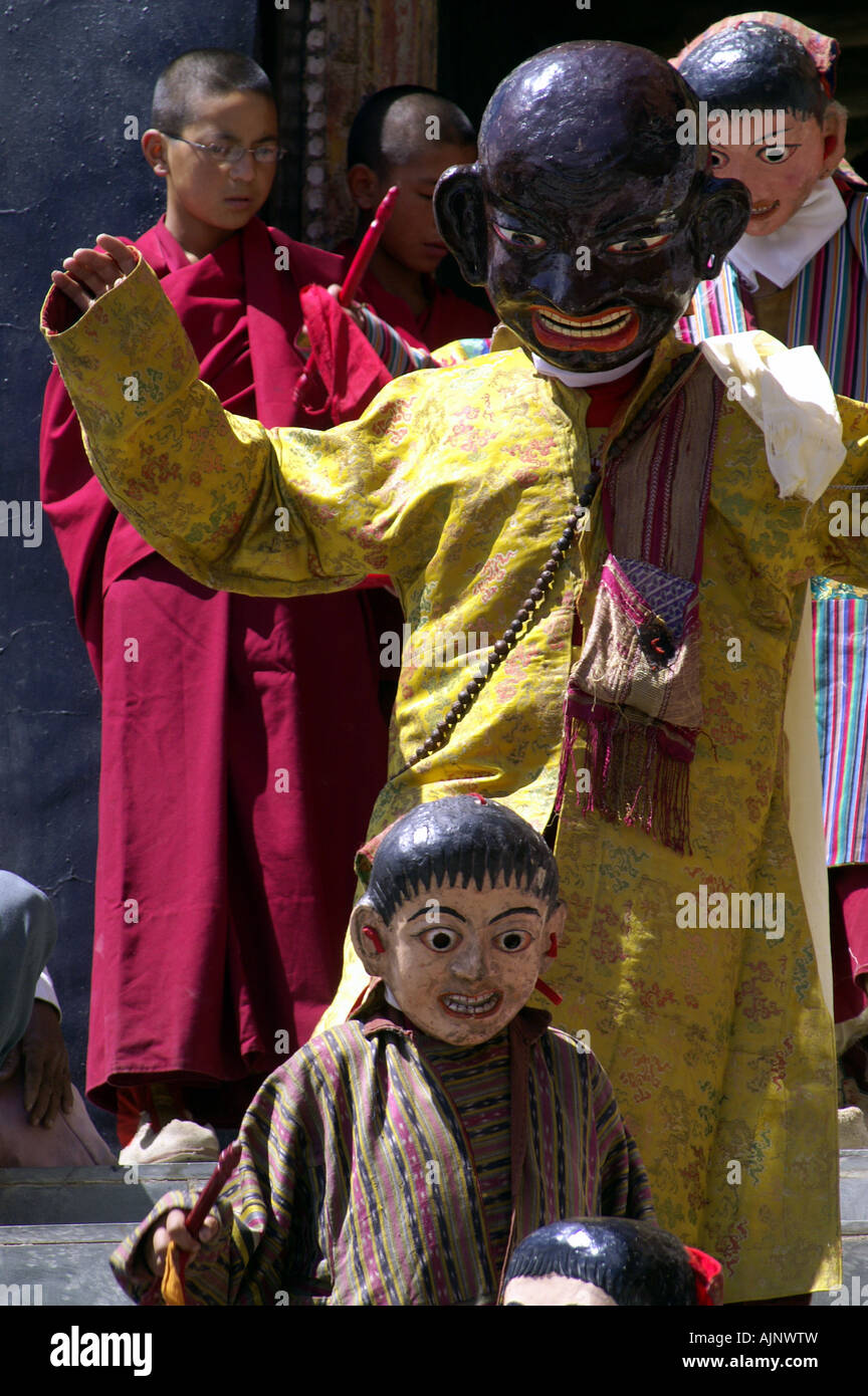 Cham dance - traditional tibetan buddhist monks dance in masks and ...