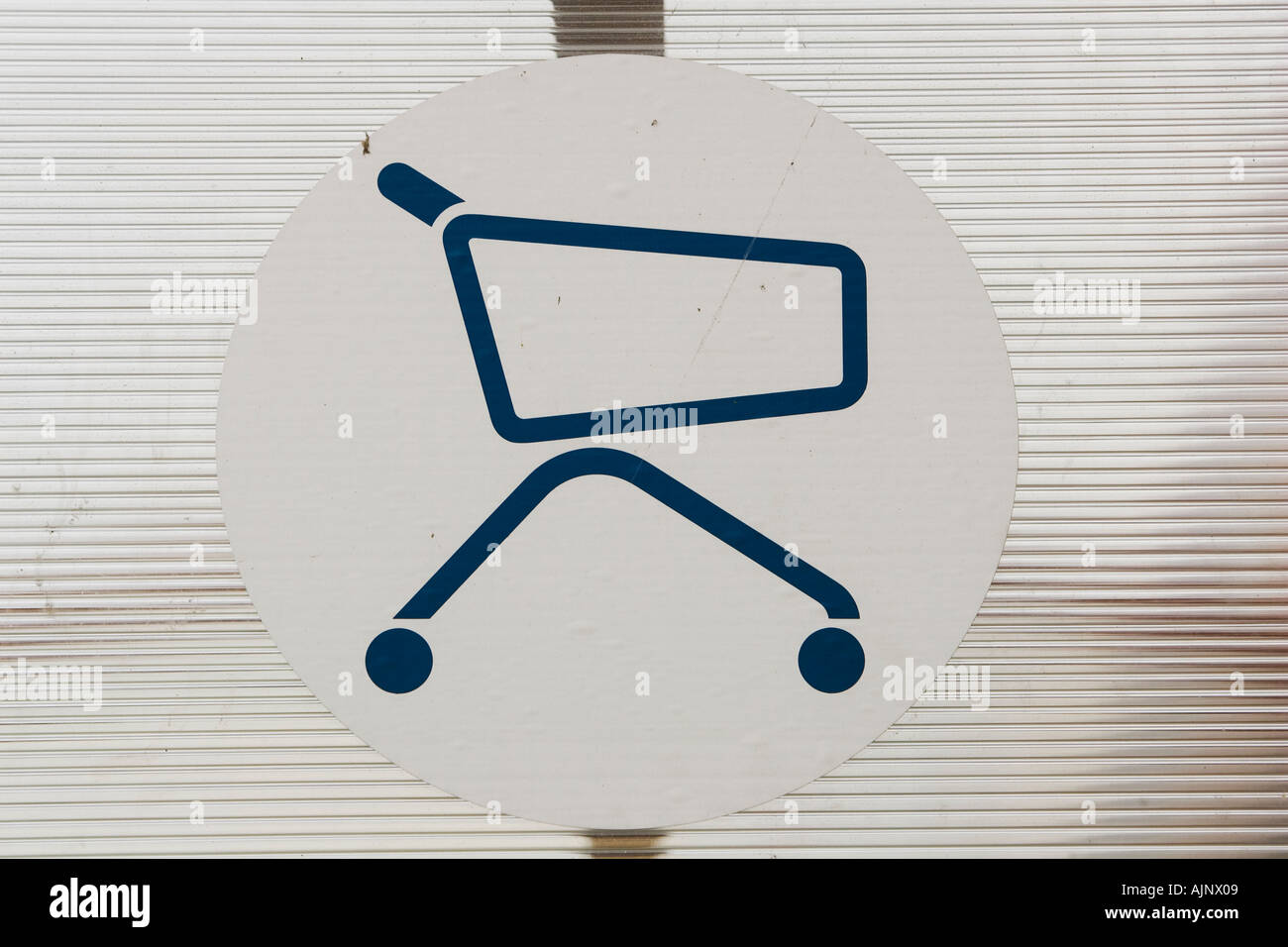 Symbol of shopping cart on a signboard Stock Photo - Alamy