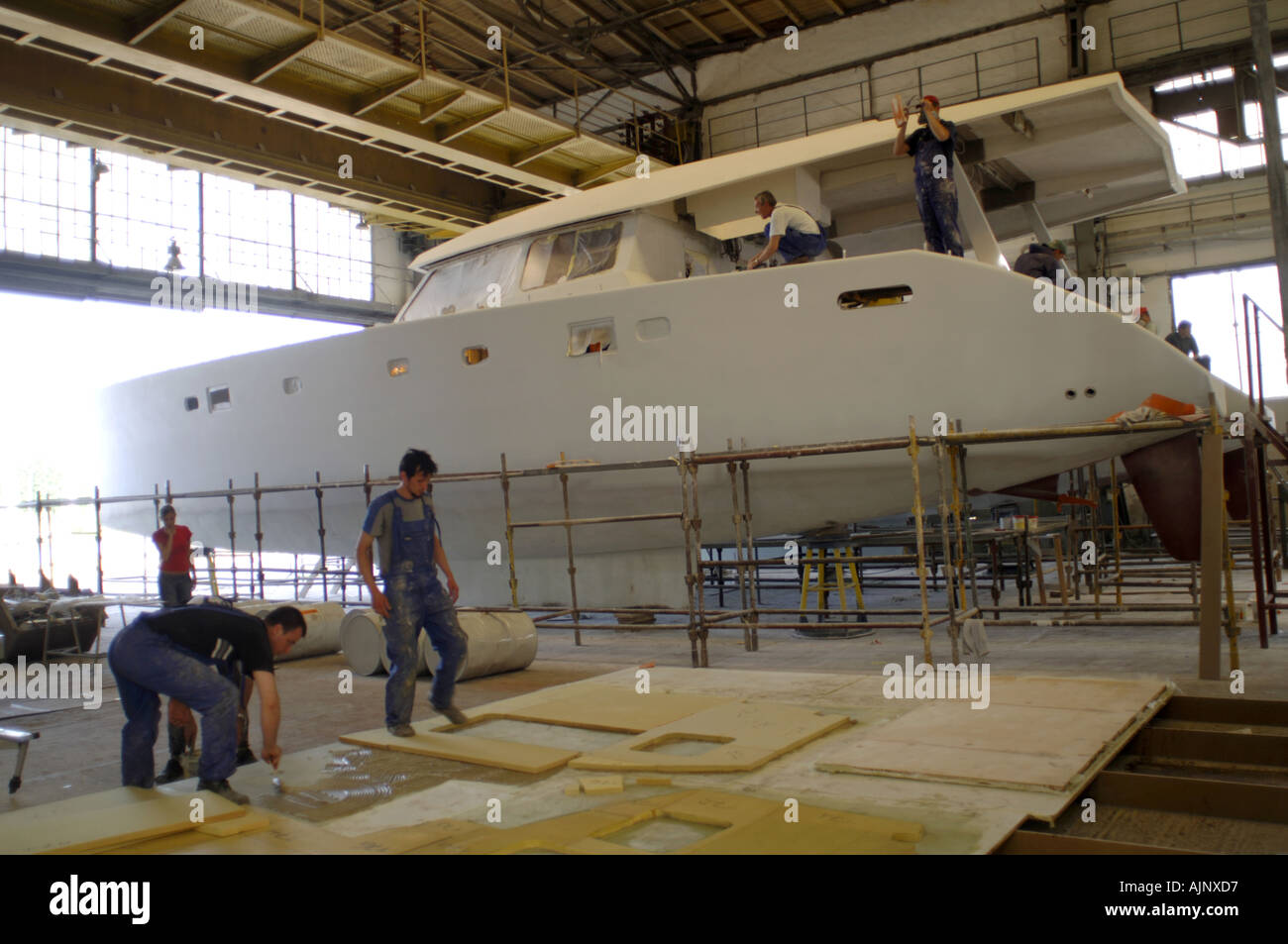 Catamaran sailing yachts built by Sunreef under construction in Gdansk ...