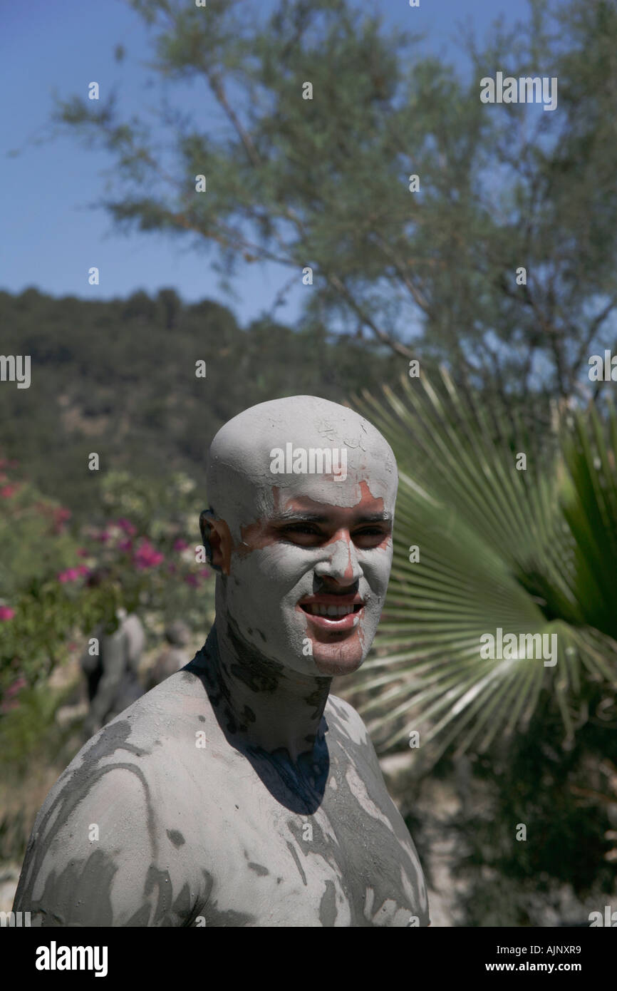 Stock photograph of tourists in a mud bath at Dalyan Turkey Stock Photo ...