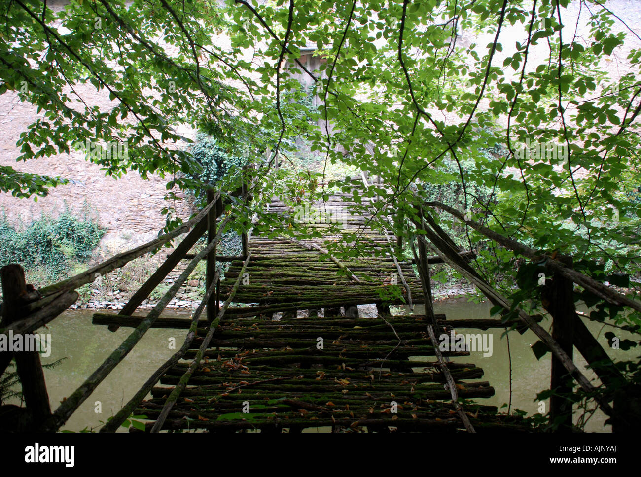 Old bridge over moat leading to castle "Le Verger" in France Stock ...