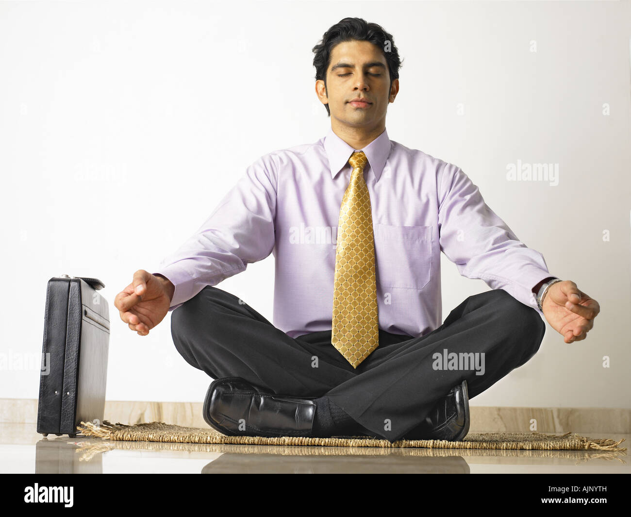 Portrait of a man meditating Stock Photo - Alamy