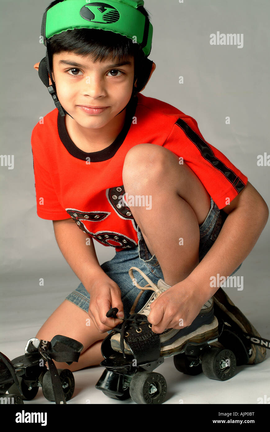 Portrait of a boy ready for Roller Skating, Studio shot Stock Photo - Alamy