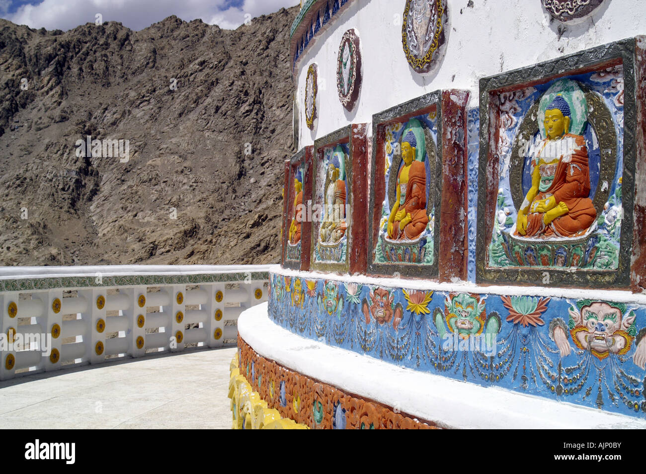 Shanti stupa in Leh, tibetan buddhist symbol decorations mural on wall ...