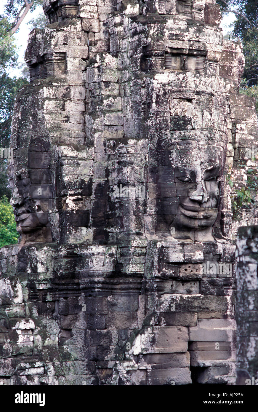 Enigmatic faces at the Bayon The central tower carved with gigantic ...