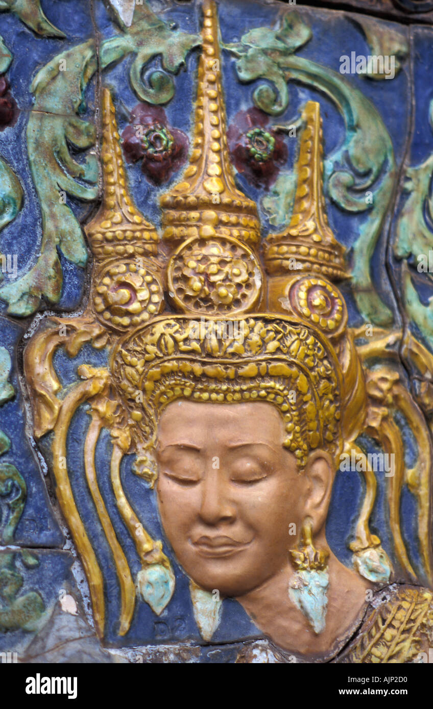 Intricately carved and painted glazed bas relief at Wat Phnom Phnom ...