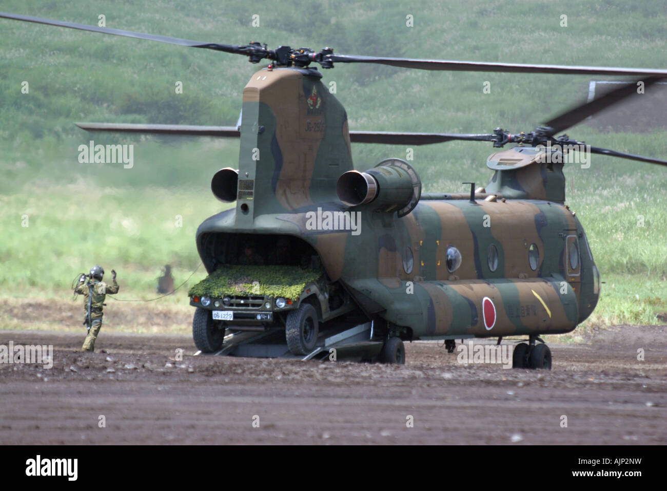 CH-47 Chinook Helicopter unloading a vehicle Japan Ground Self Defence ...