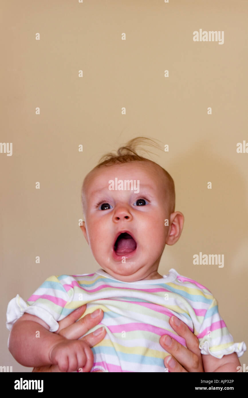 Portrait of baby girl a few months old with a look of surprise Stock ...
