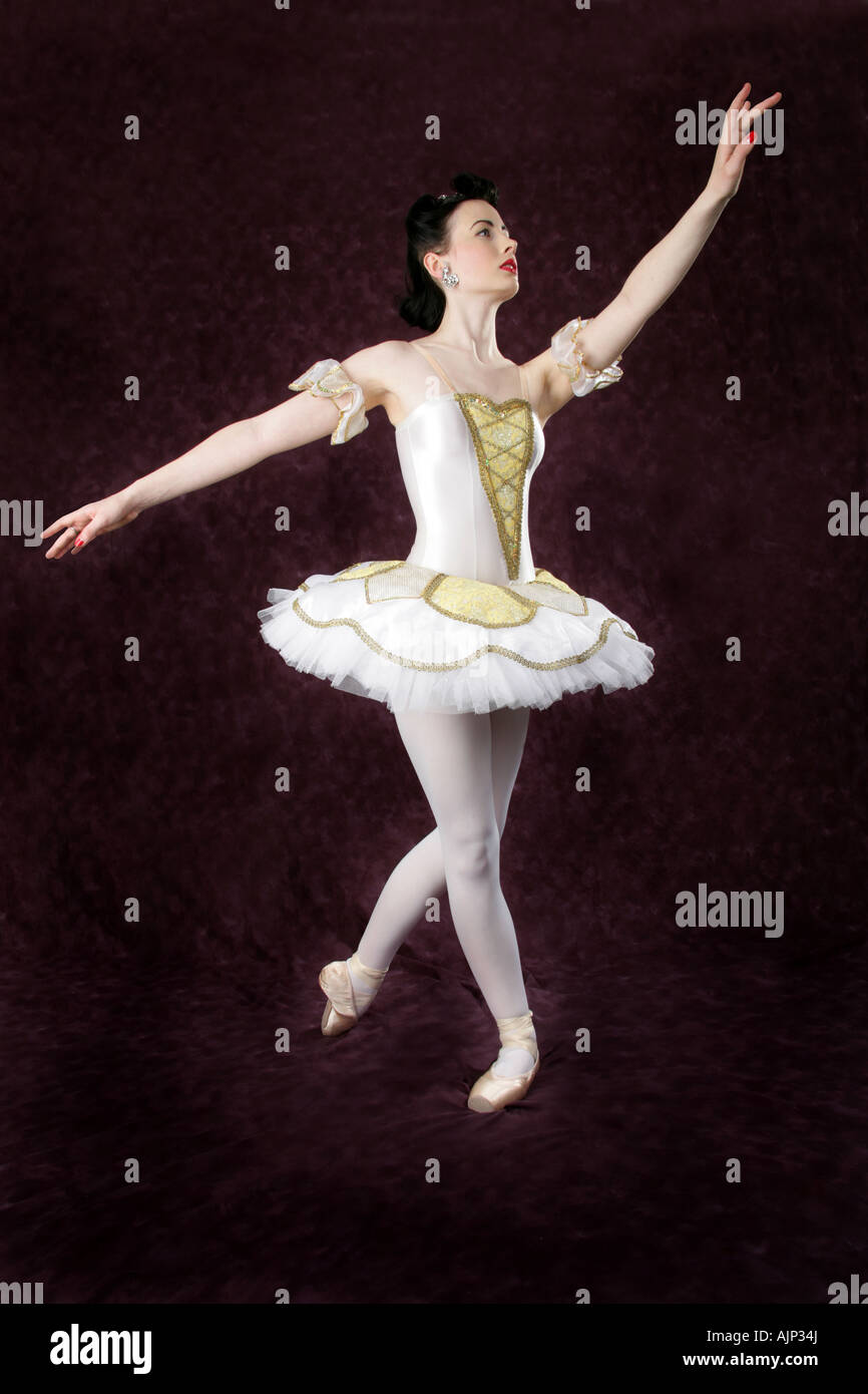 Ballerina in a White and Yellow Ballet Costume Stock Photo - Alamy