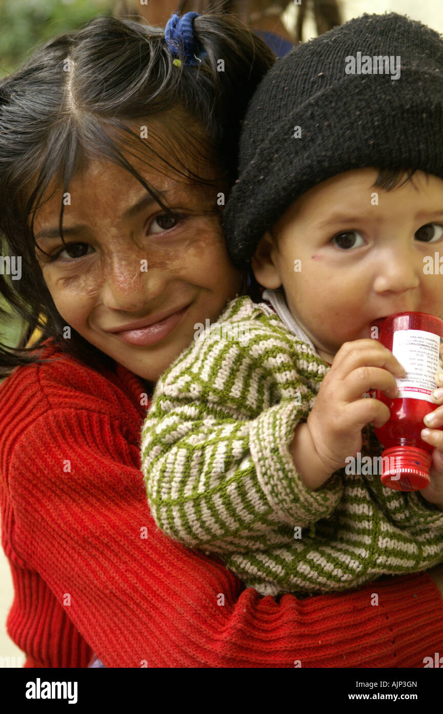 Happy indian girl with baby boy brother hug Stock Photo - Alamy
