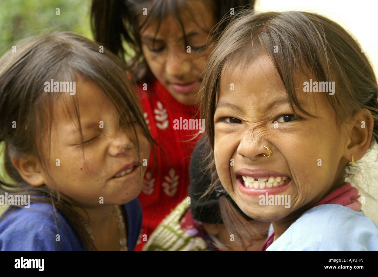 Group of indian children making funny faces happy smile Stock Photo - Alamy