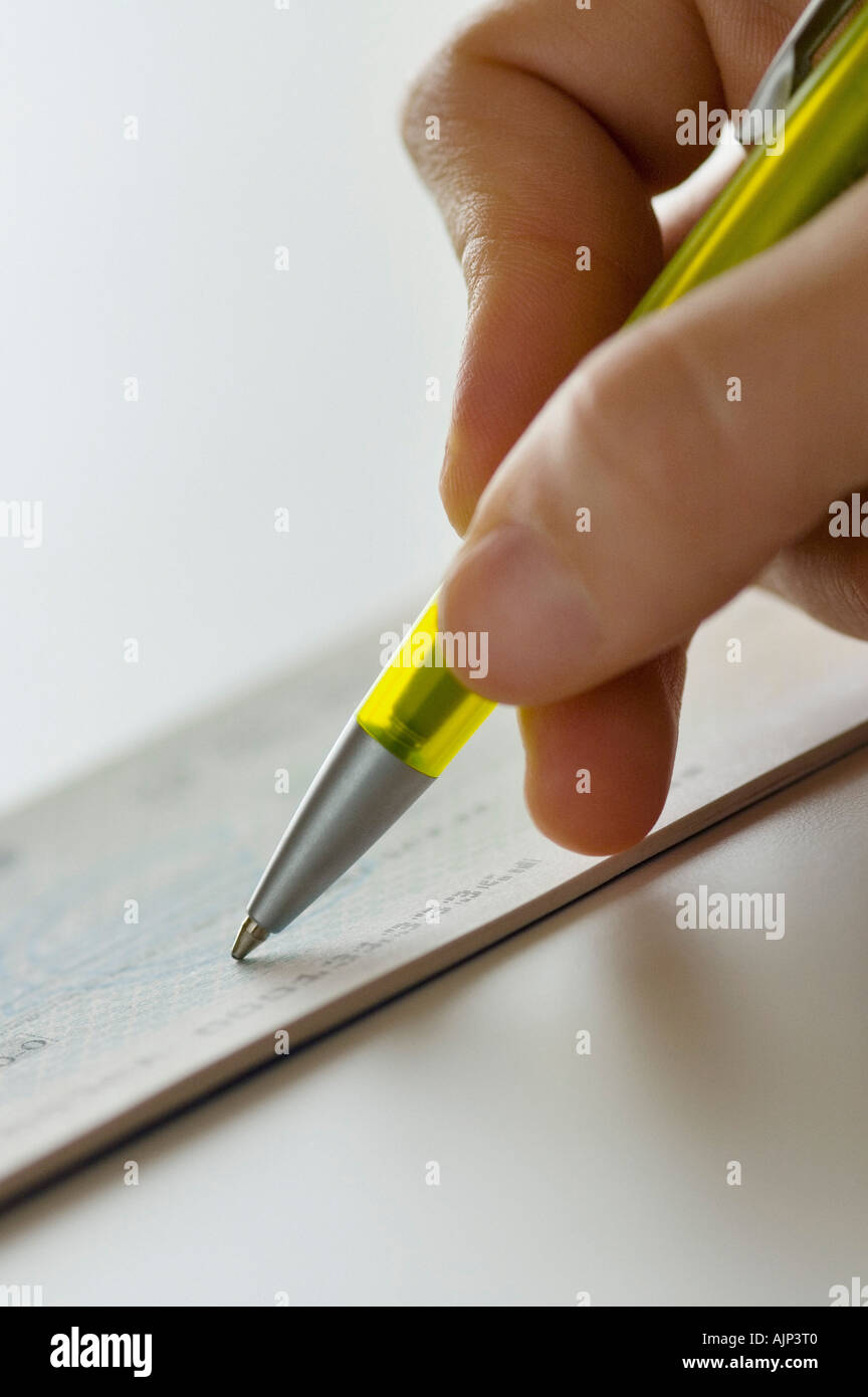 Cheque book pen signature hi-res stock photography and images - Alamy
