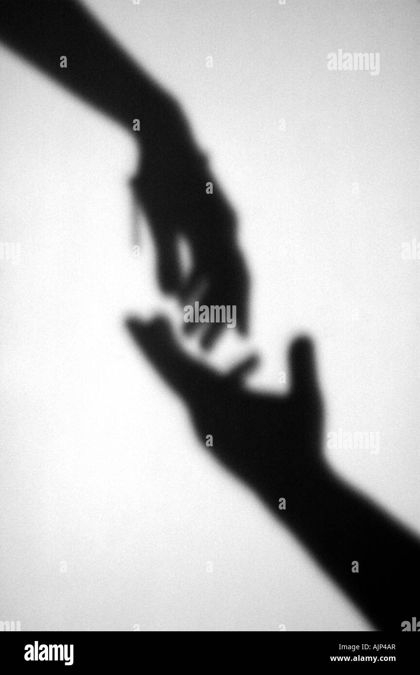 Close-up of extended hands Stock Photo - Alamy