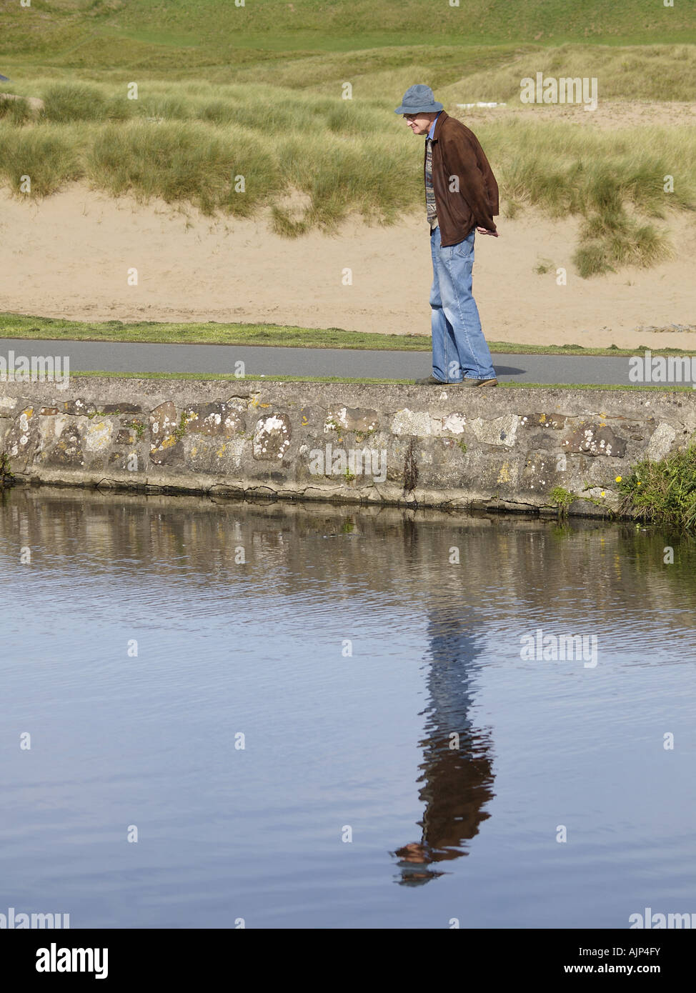 Man looking reflection in water hi-res stock photography and images - Alamy