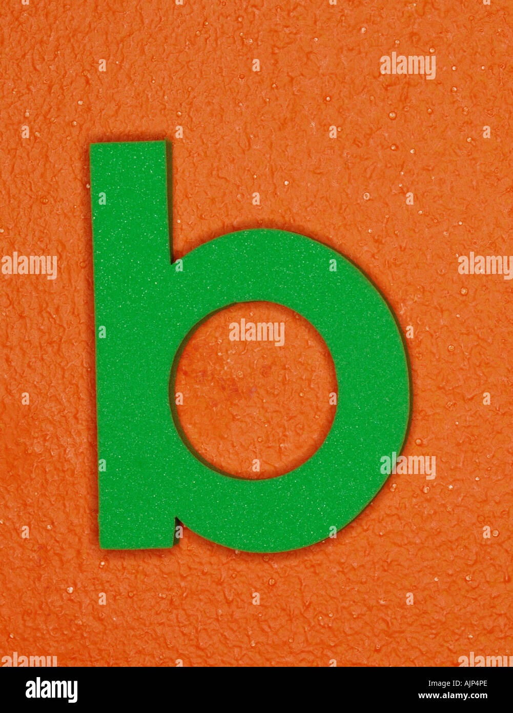 GREEN ALPHABET LETTER B ON ORANGE BACKGROUND Stock Photo - Alamy