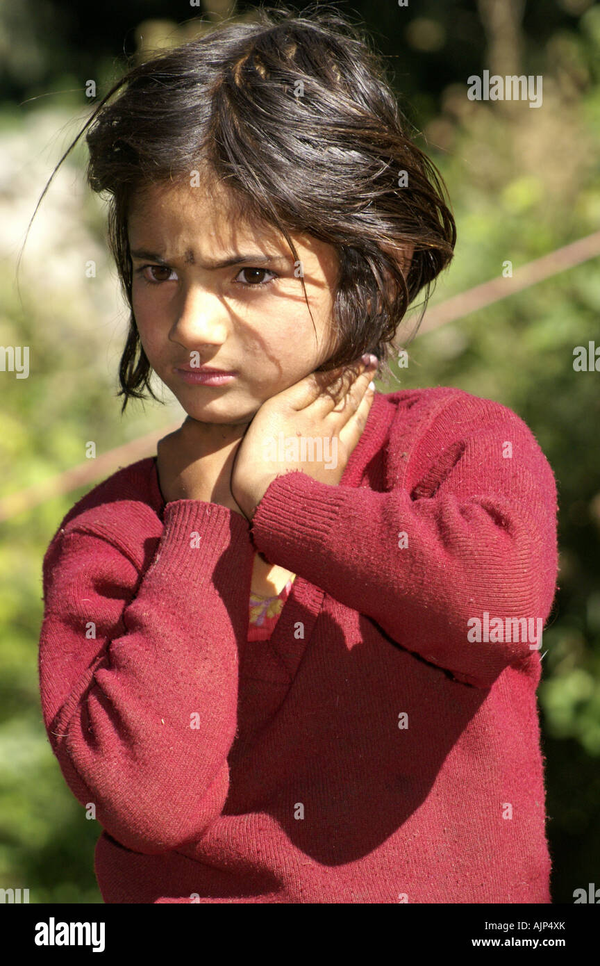 One young indian girl child kid looking curious waiting standing Stock ...