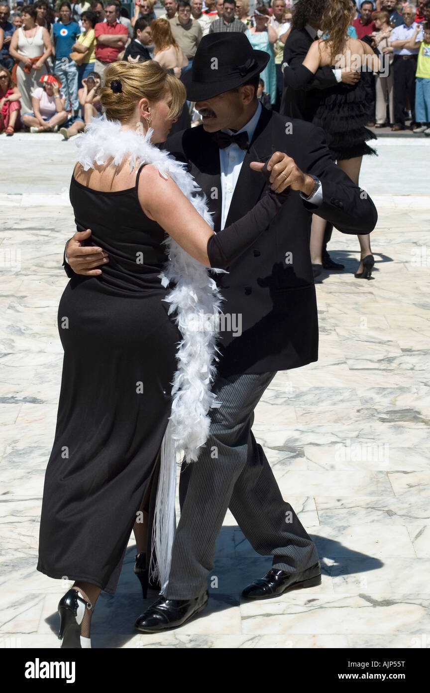 Tango dancers in a street contemporary dance & theater festival. Plaza ...