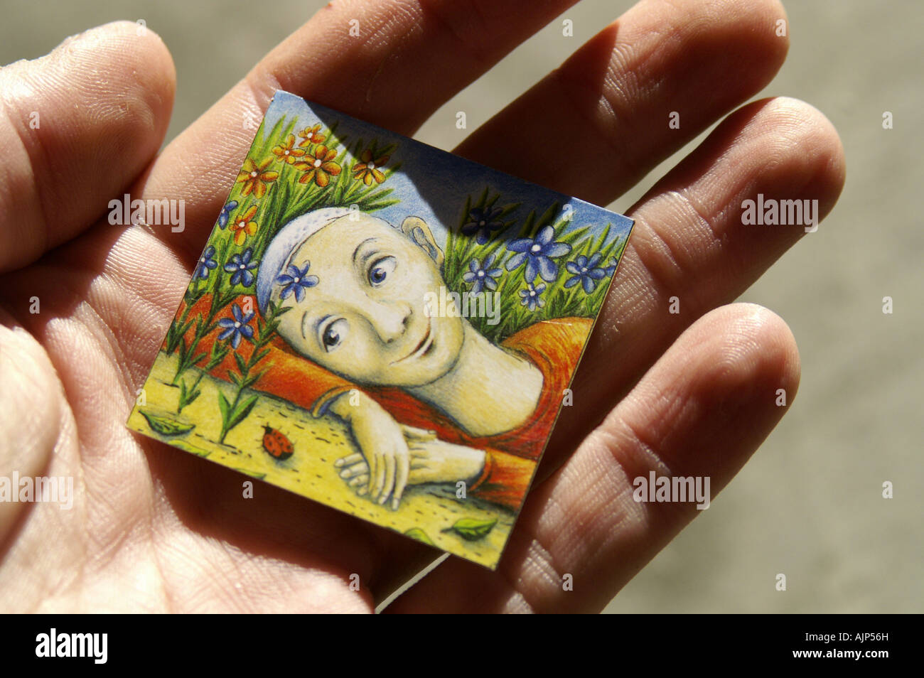 Image of happy smiling man picture drawing in human open palm hand ...