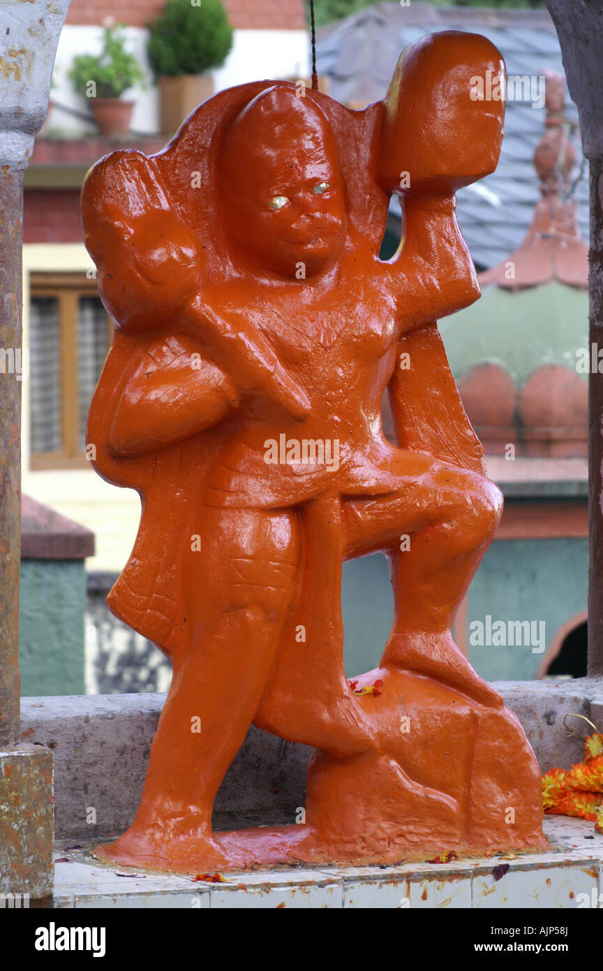 Orange Hanuman hindu holy statue in Bhagsunag temple, India Stock Photo ...