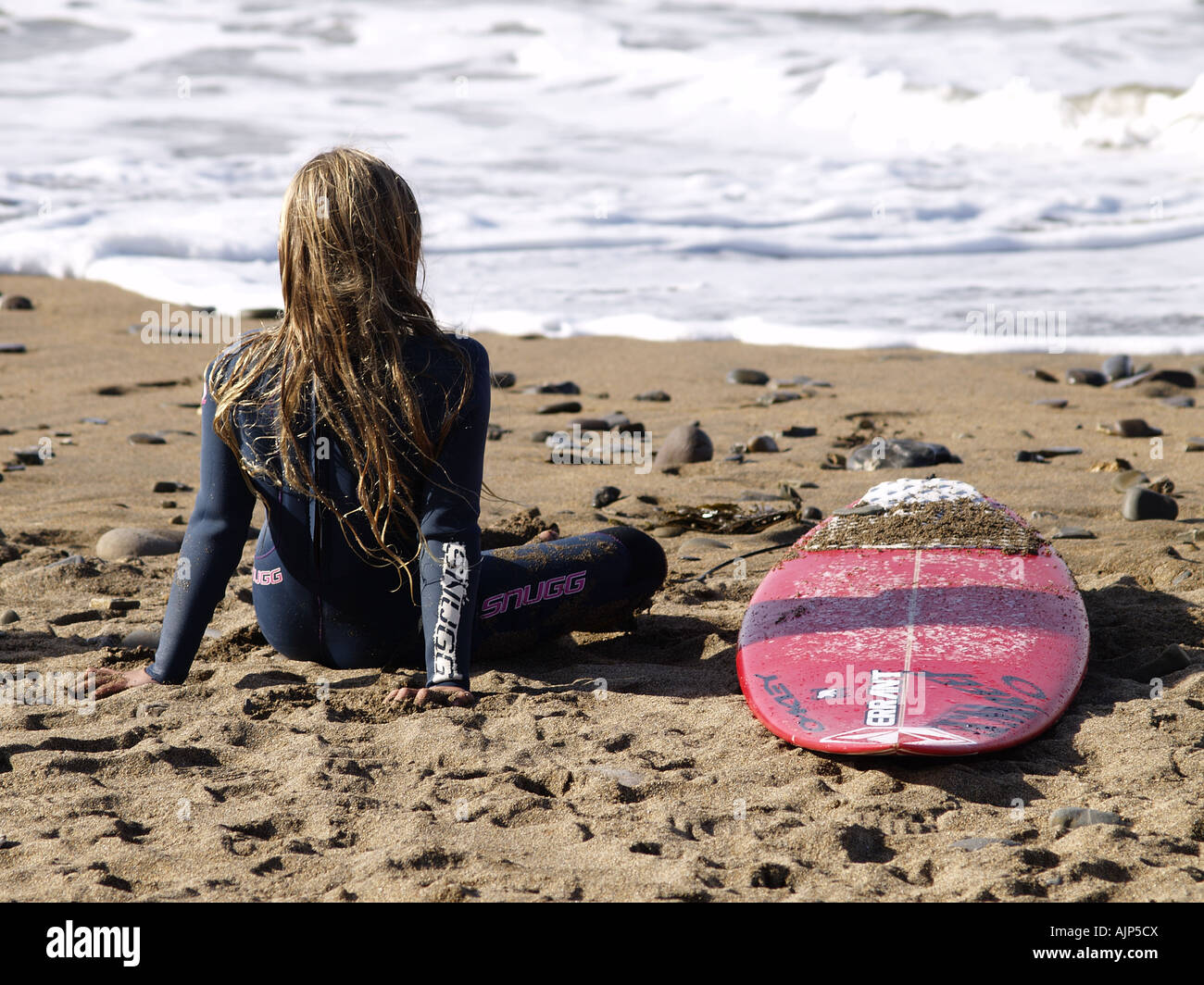 Surfer girl relaxing on surfboard hi-res stock photography and images ...