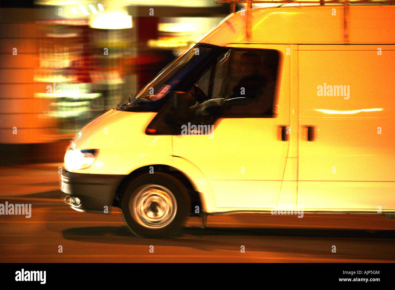 Van in motion Stock Photo - Alamy