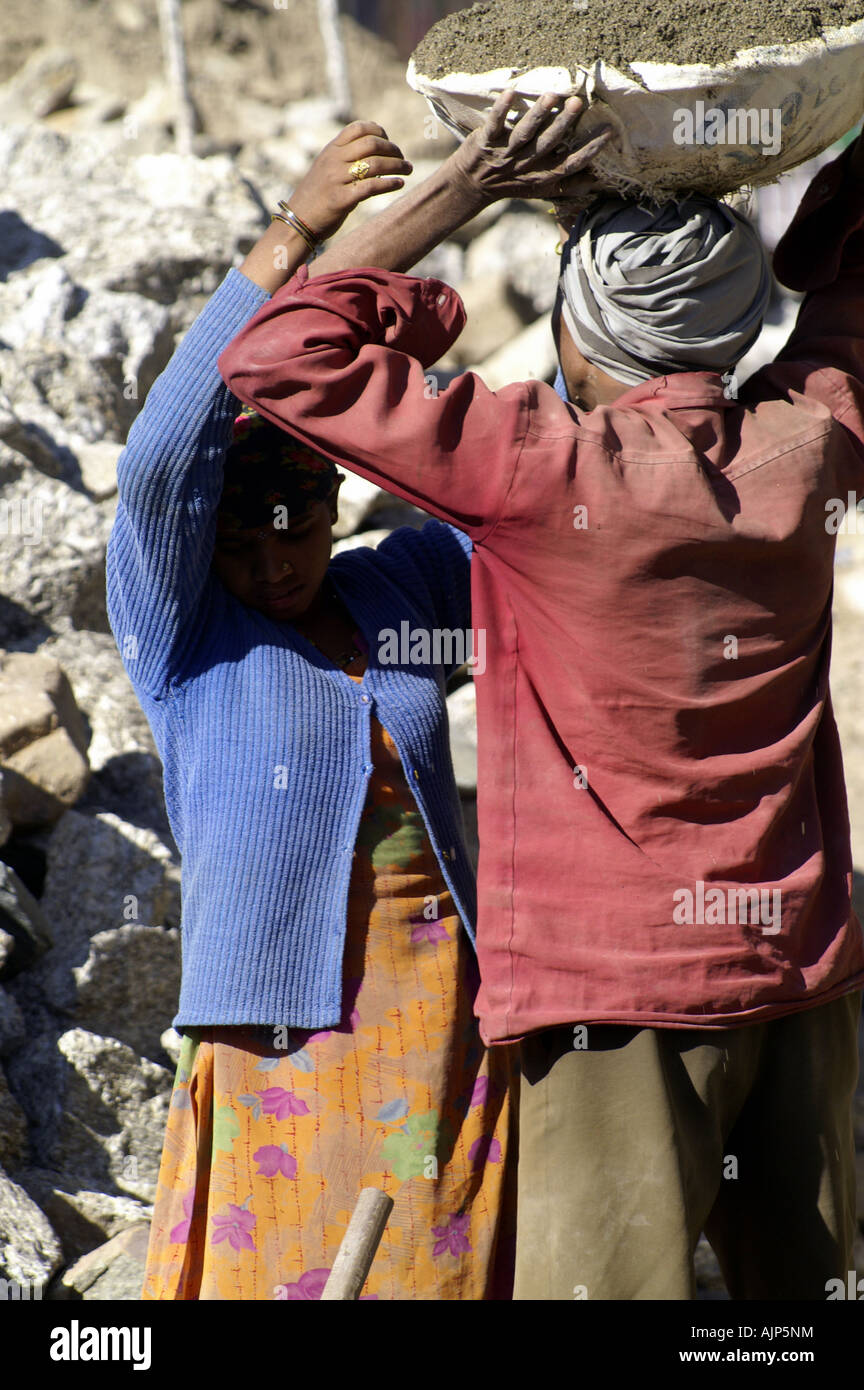 Woman Carrying Heavy Load On Head High Resolution Stock Photography and ...