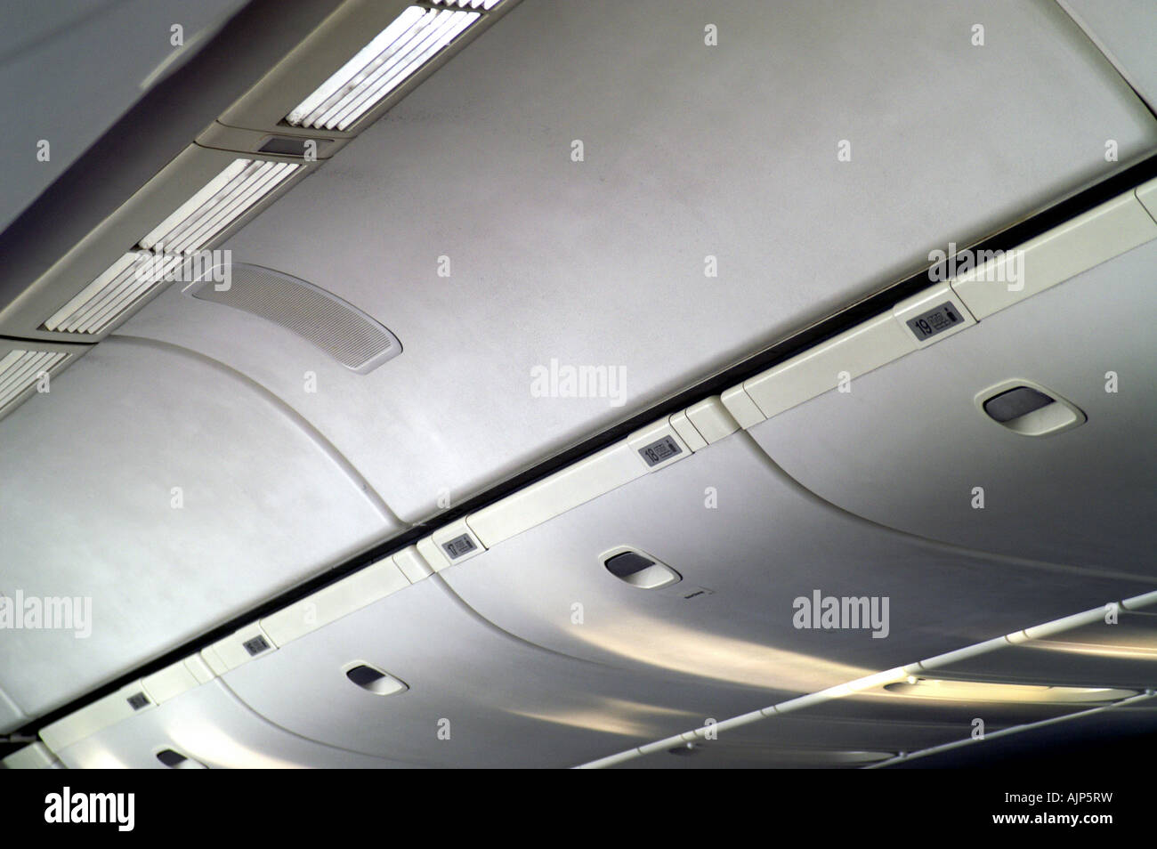 Overhead Locker Plane Stock Photos & Overhead Locker Plane Stock Images ...