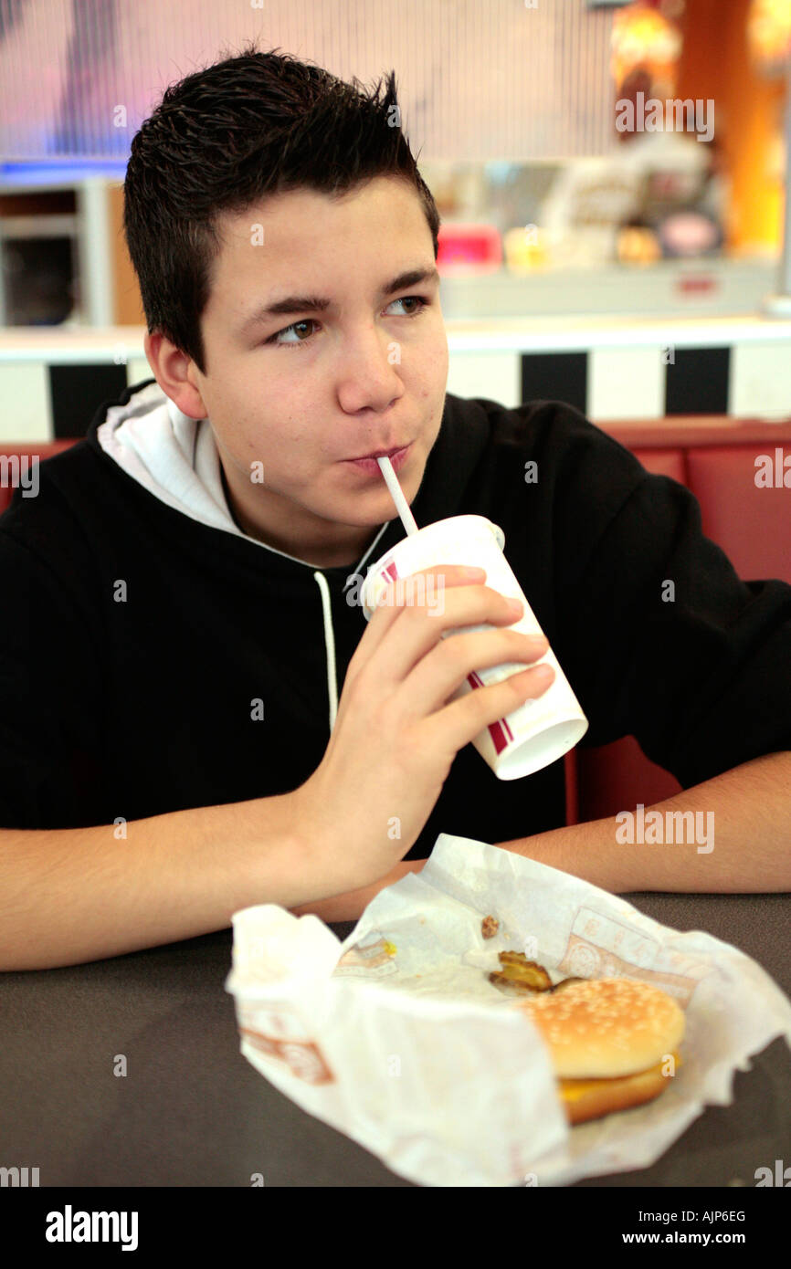 teenager at a fast food restaurant Stock Photo - Alamy