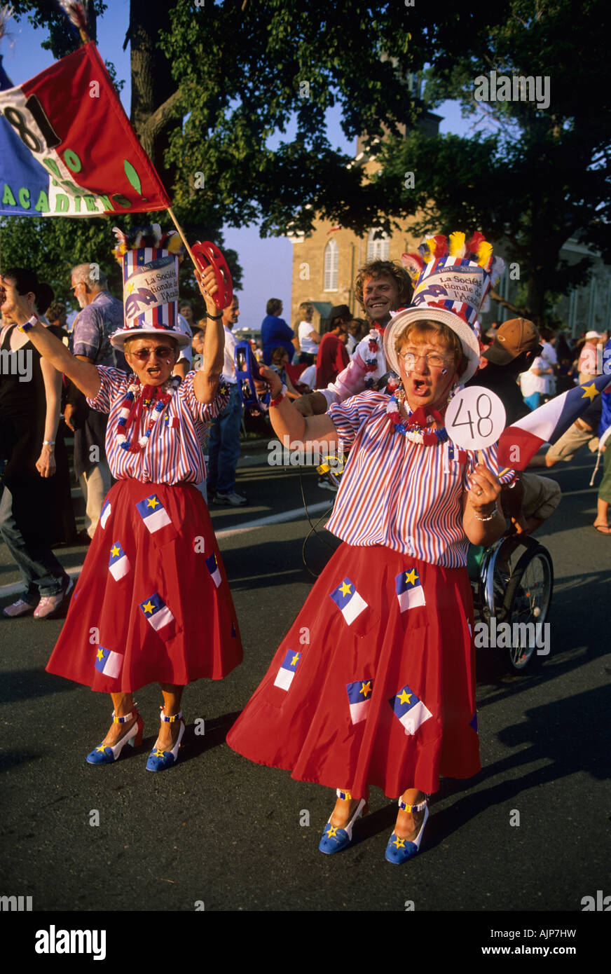Women dressed in acadian colours at the acadian 'Tintamarre ...