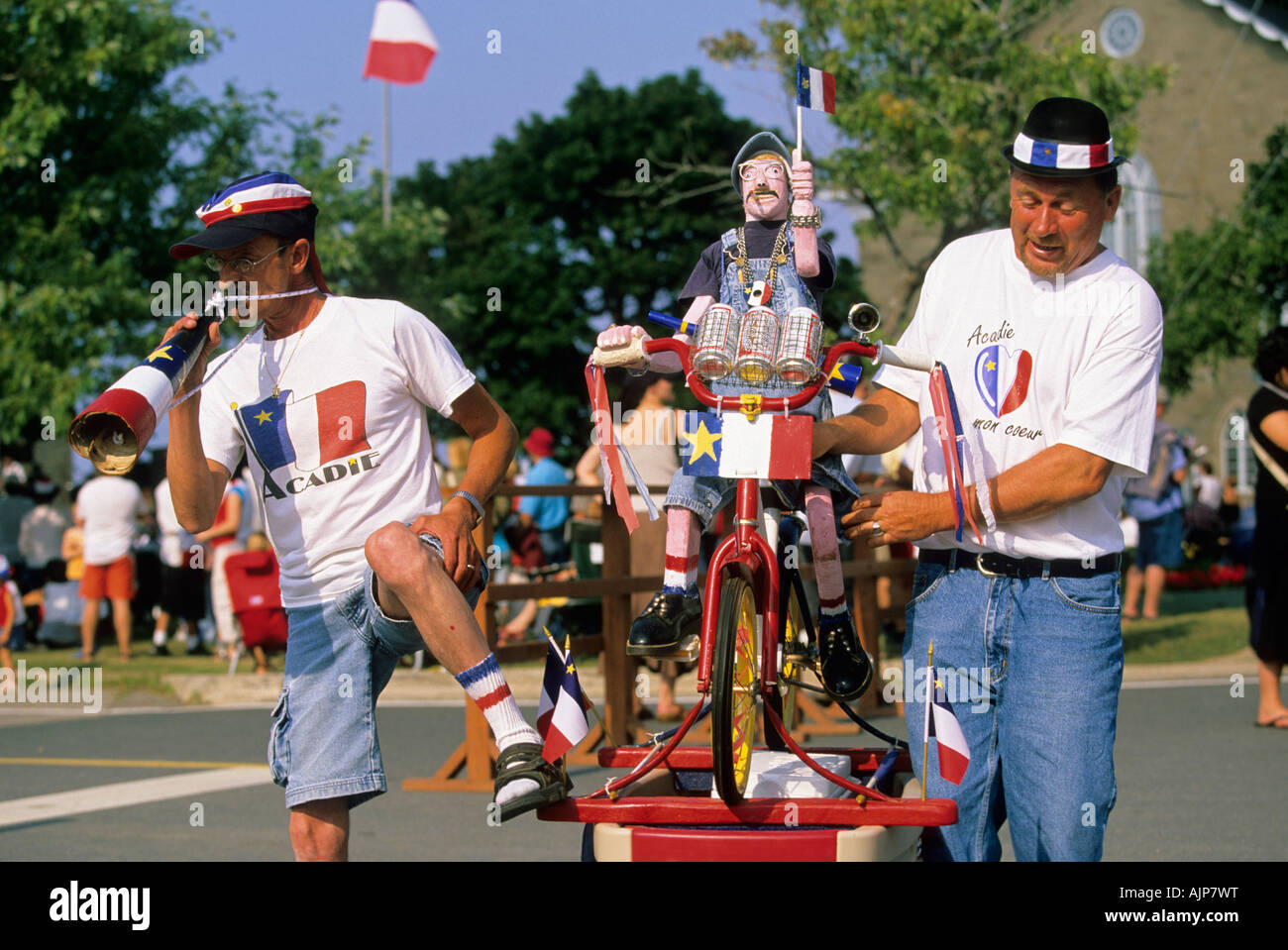 Men with "dummy" parade float at the acadian 'Tintamarre" celebration ...