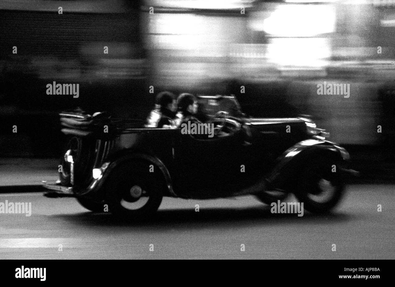 Old open car in Piccadilly Circus 1963 Stock Photo - Alamy