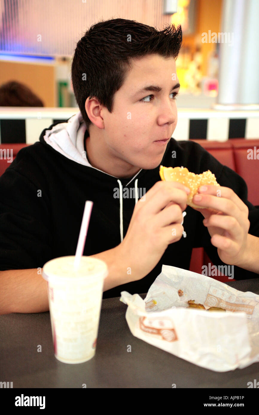 teenager at a fast food restaurant Stock Photo - Alamy