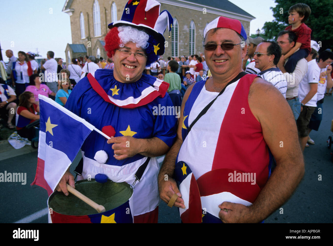 Men dressed in acadian colours at the acadian 'Tintamarre" celebration ...