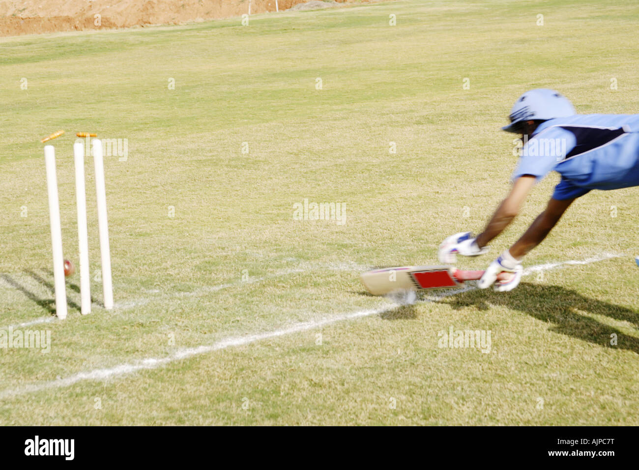 A batsman getting run out Stock Photo - Alamy