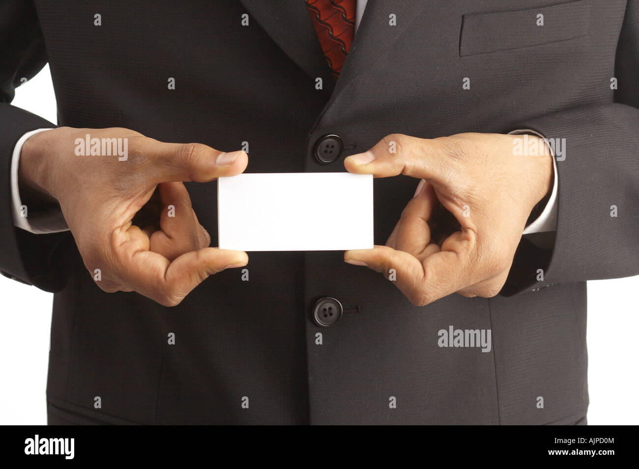A Businessman holding a label Stock Photo - Alamy