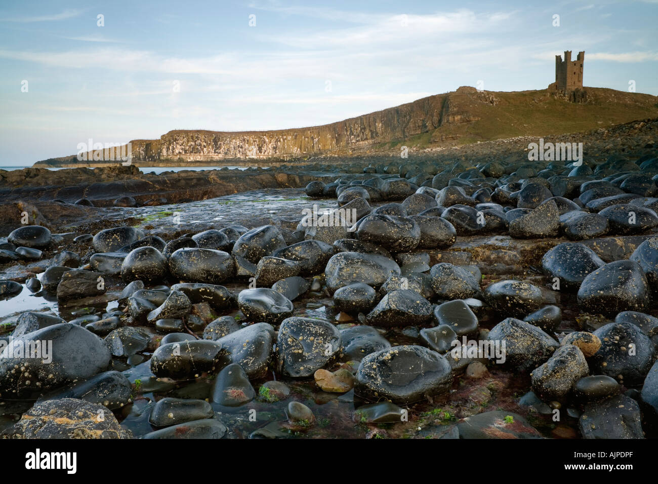 Dunstanburgh cliffs hi-res stock photography and images - Alamy